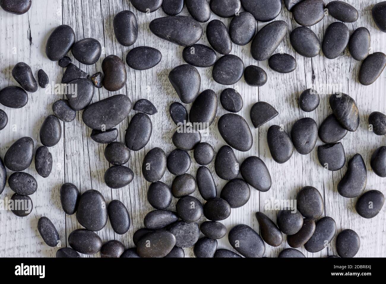 A studio photo of black river rocks Stock Photo - Alamy