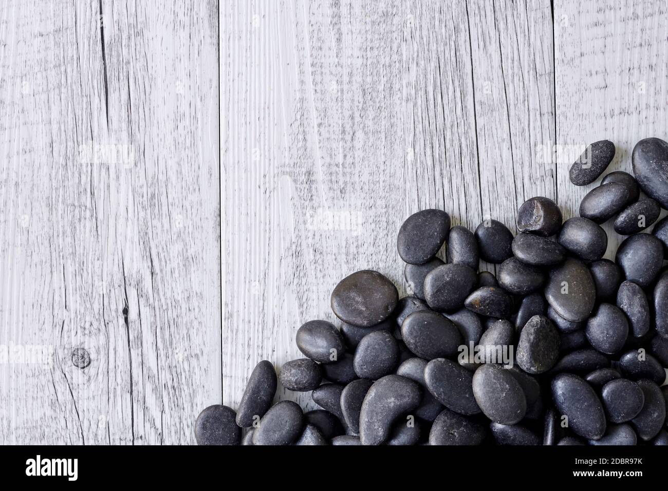 A studio photo of black river rocks Stock Photo - Alamy