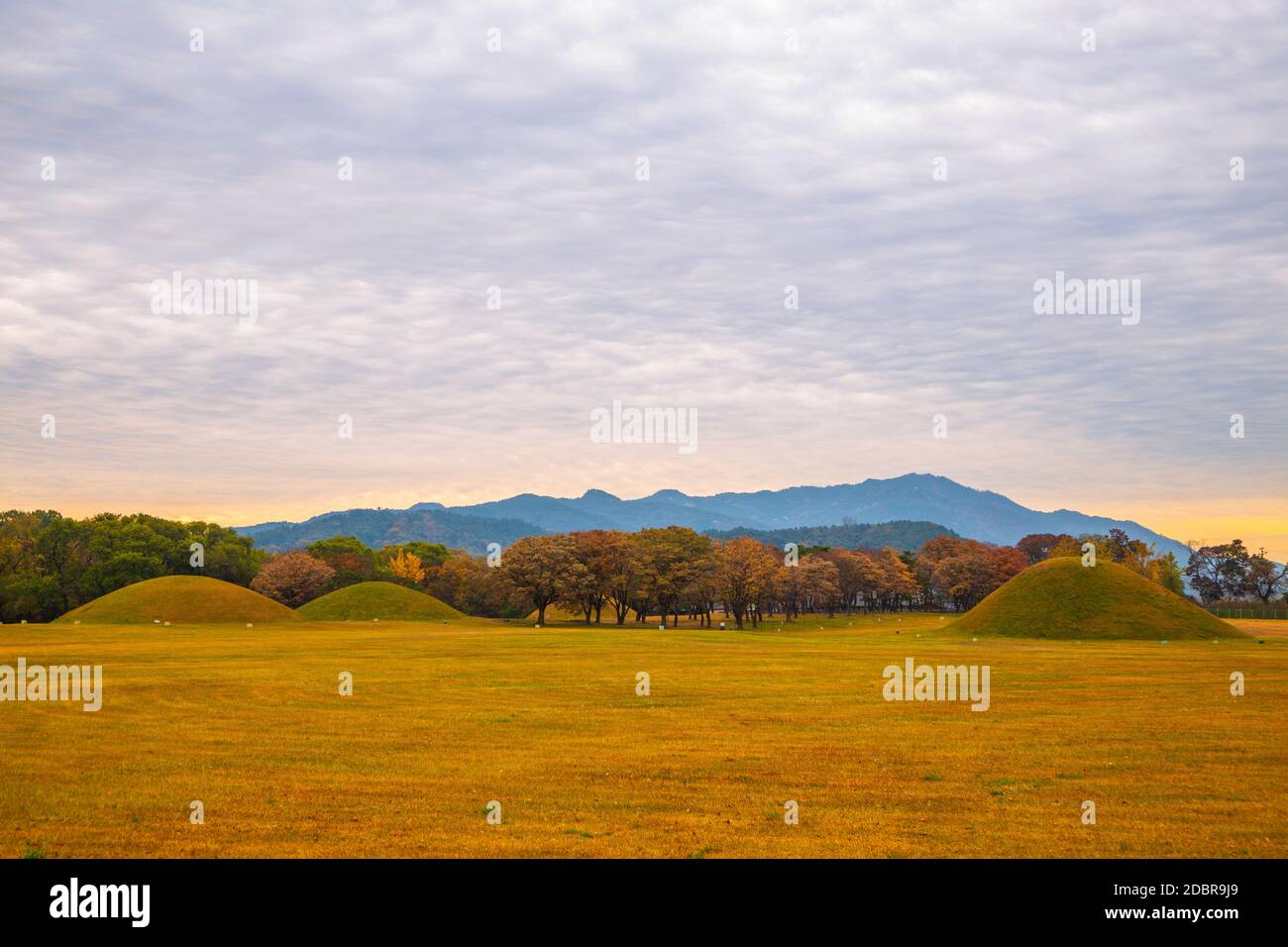 Sunset of Inwang-dong ancient tomb complex at autumn in Gyeongju, Korea ...