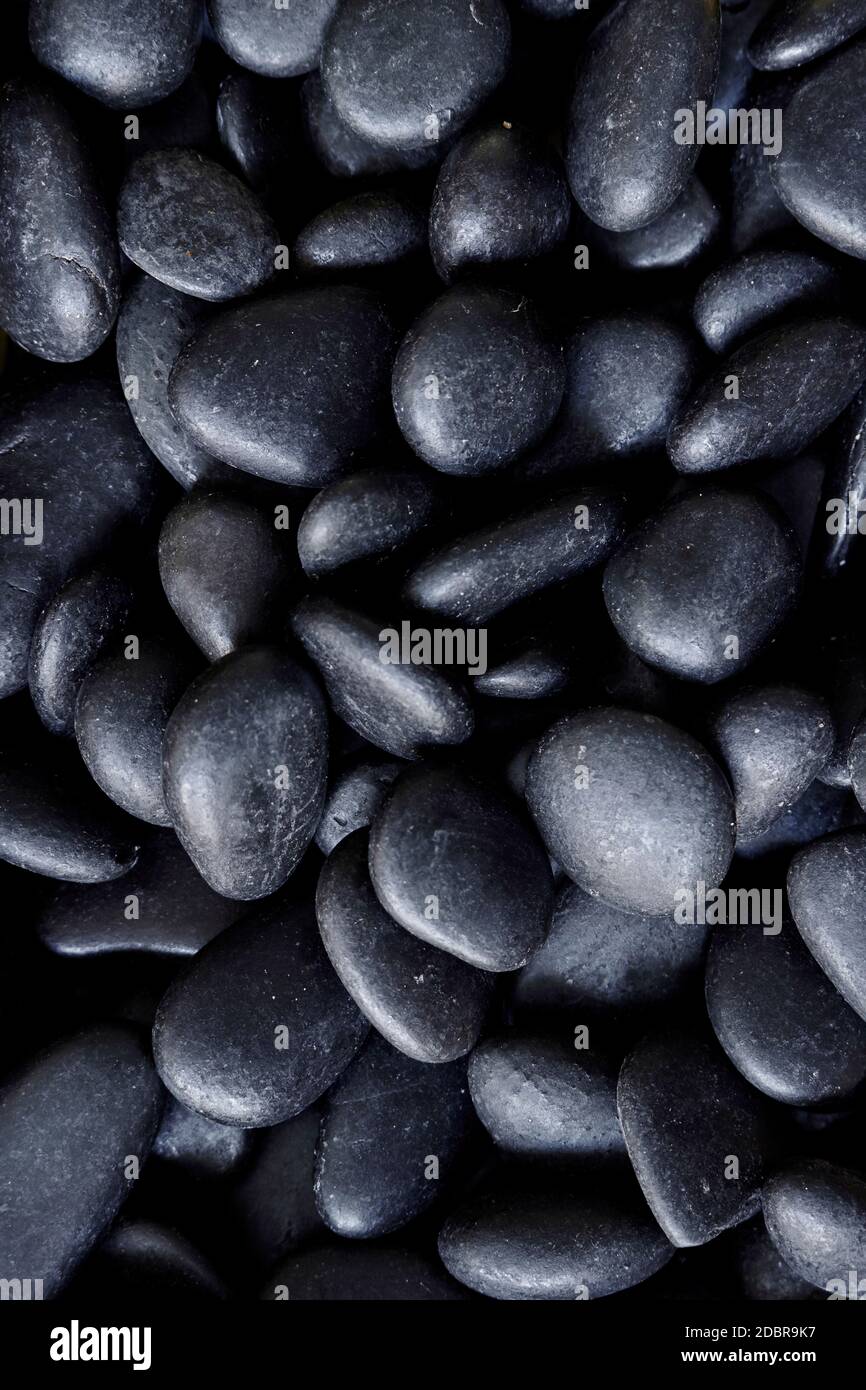 A studio photo of black river rocks Stock Photo - Alamy