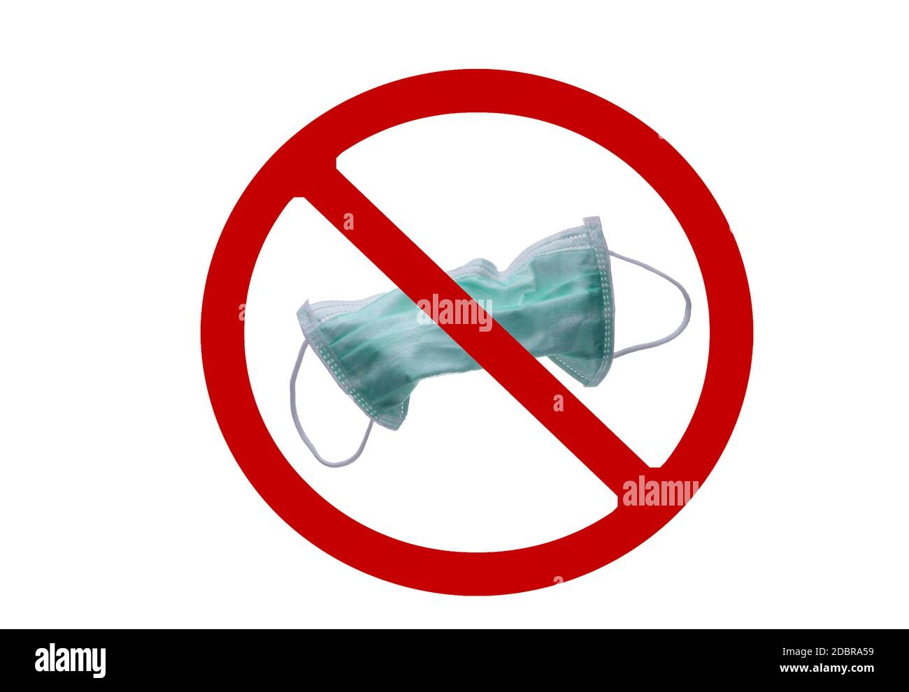Used green surgical face mask in red forbidden symbol on white ...