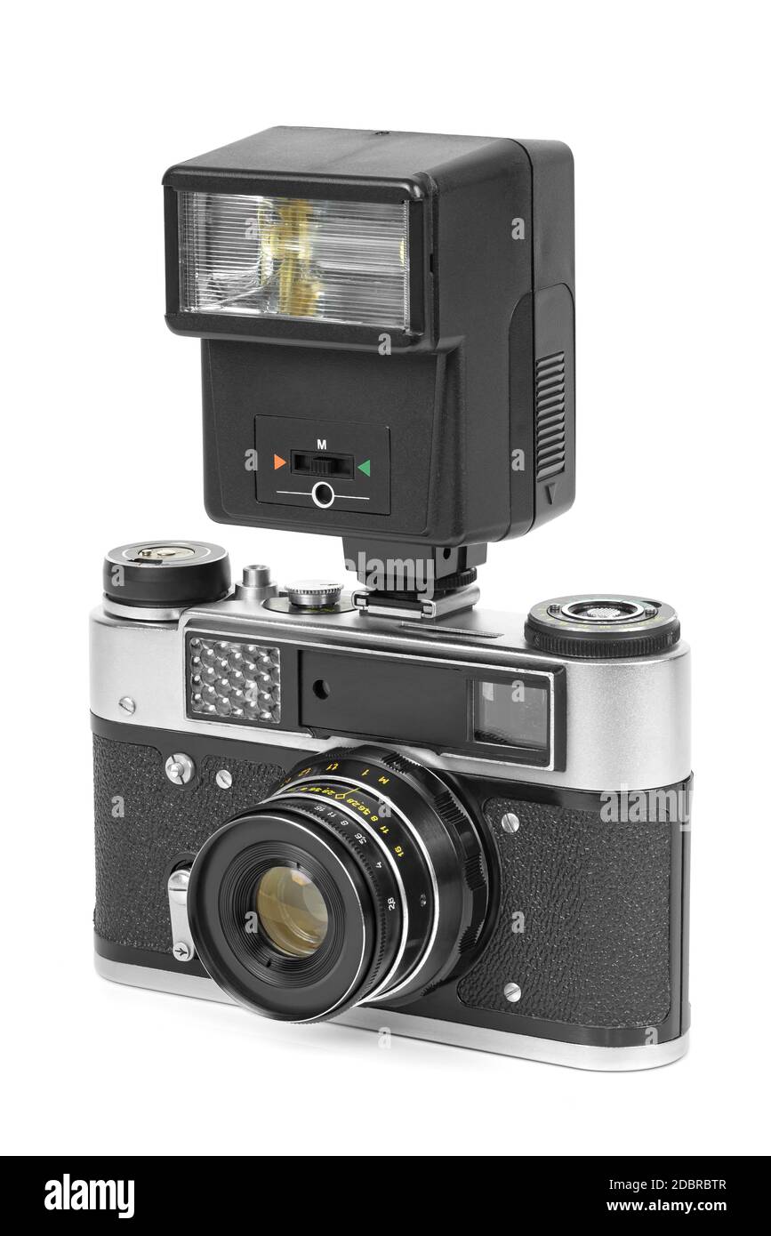 Vintage analog camera with manual flash light isolated on white ...