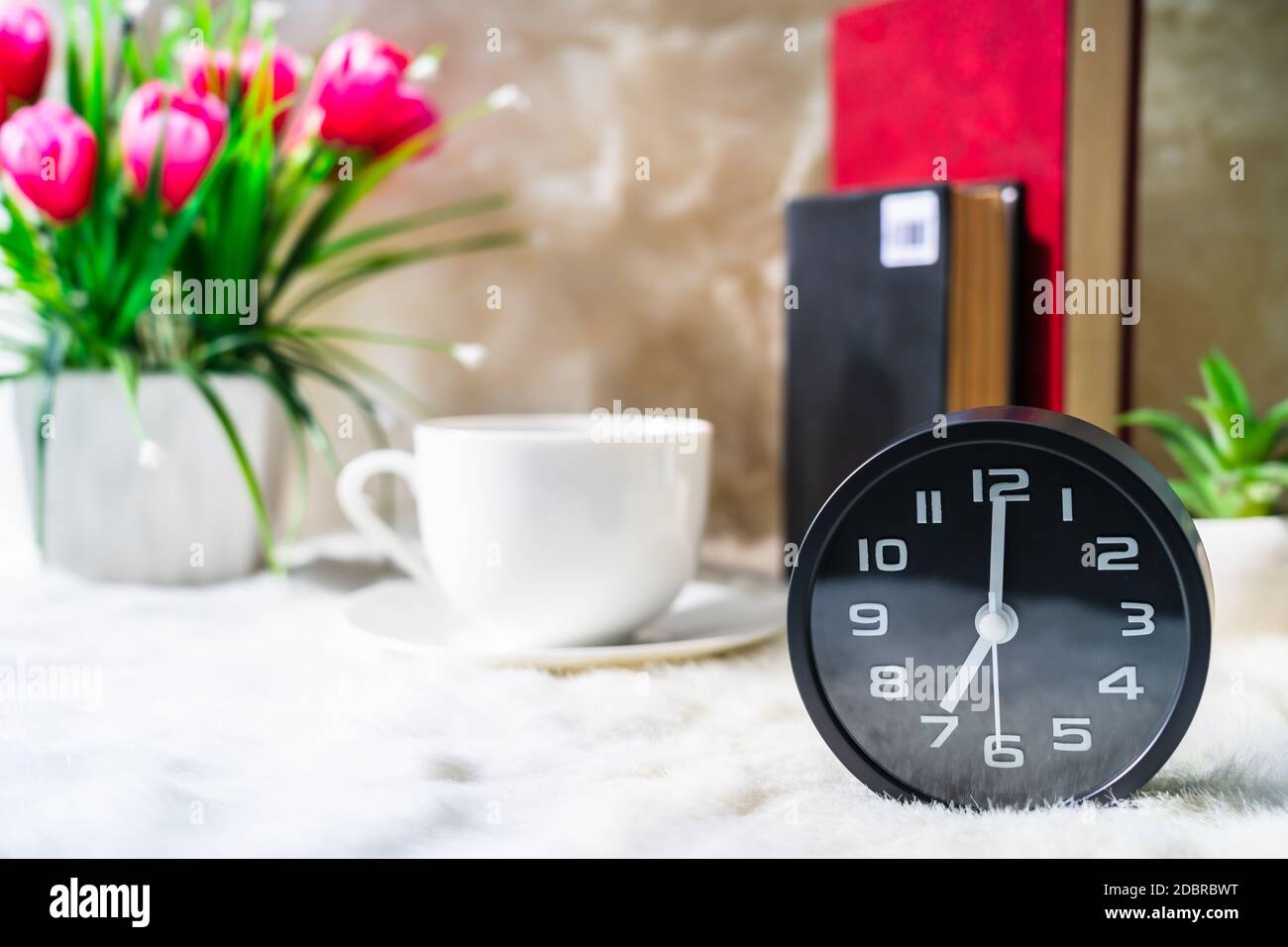 Black clock and cup of coffee ,Coffee time in the morning Stock Photo ...