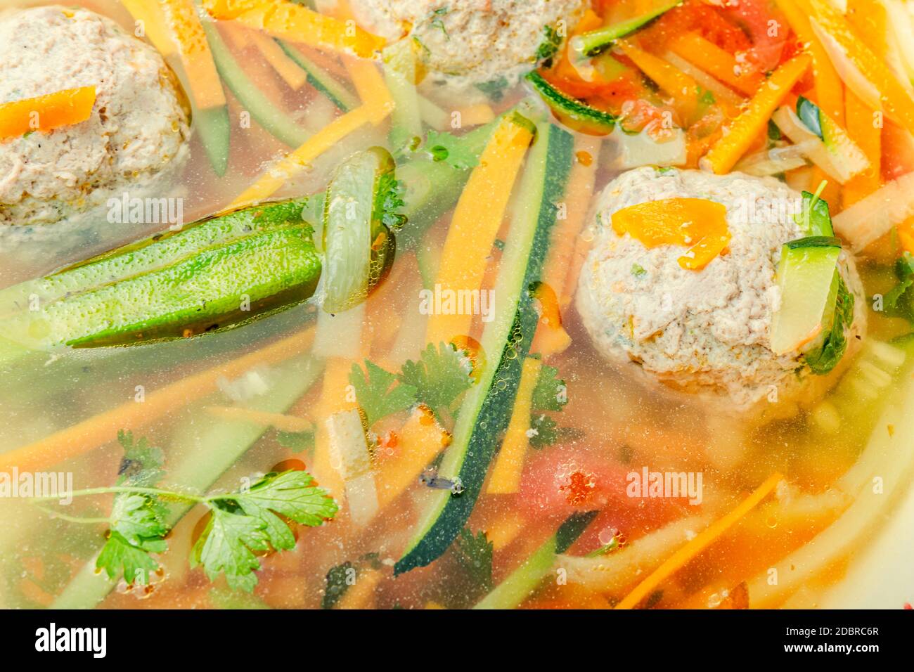 Homemade vegetable soup with meatballs and vegetables.Soup with ...