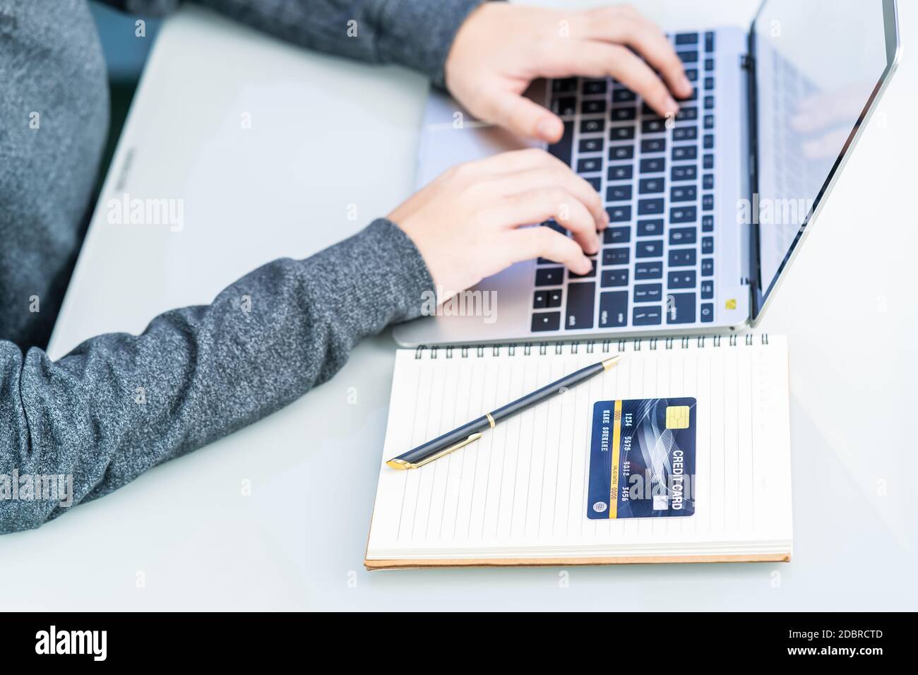 Woman using laptop payment credit card and for online shopping, Close ...