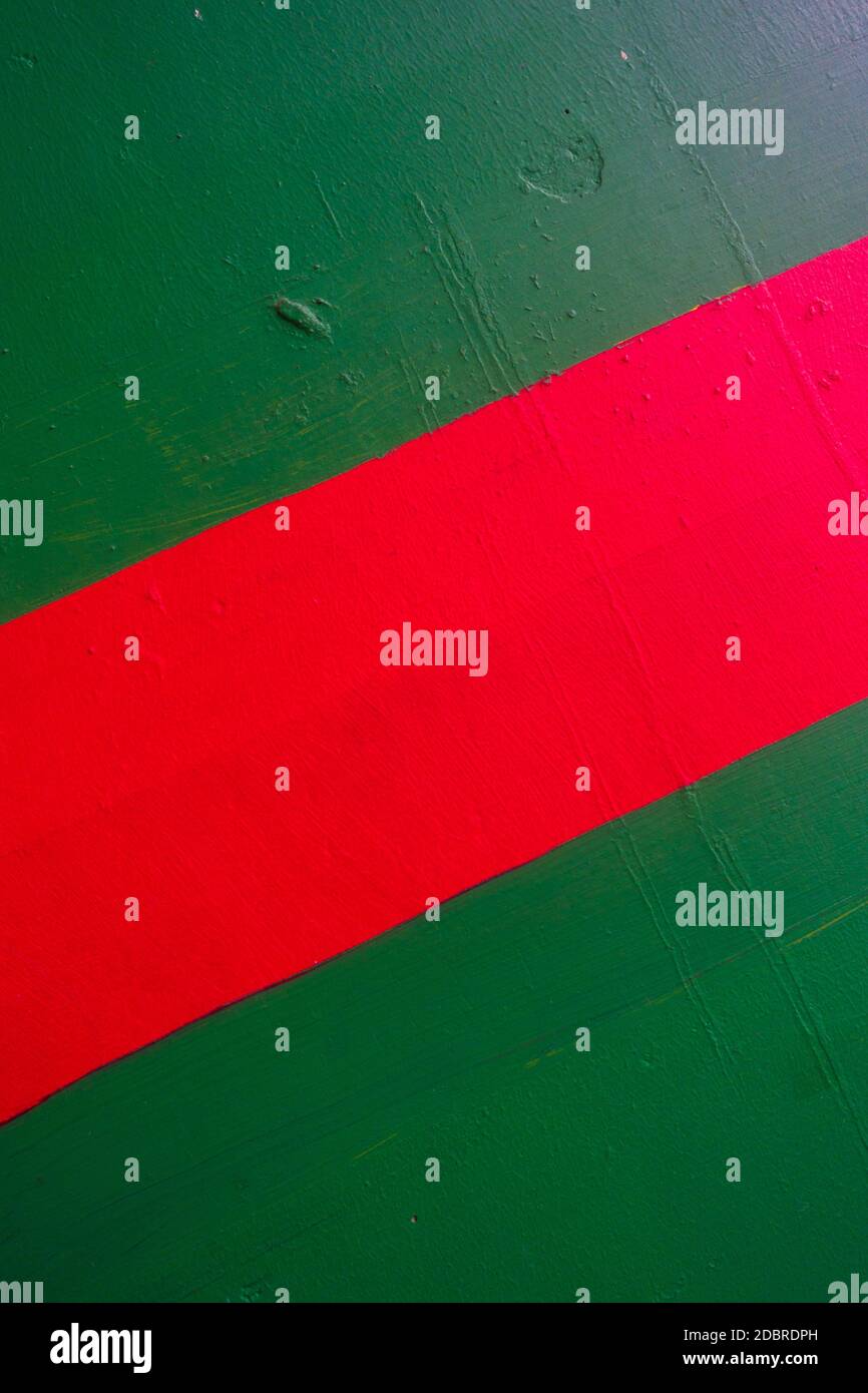 a red and green stripe on a metal pole UK Stock Photo - Alamy