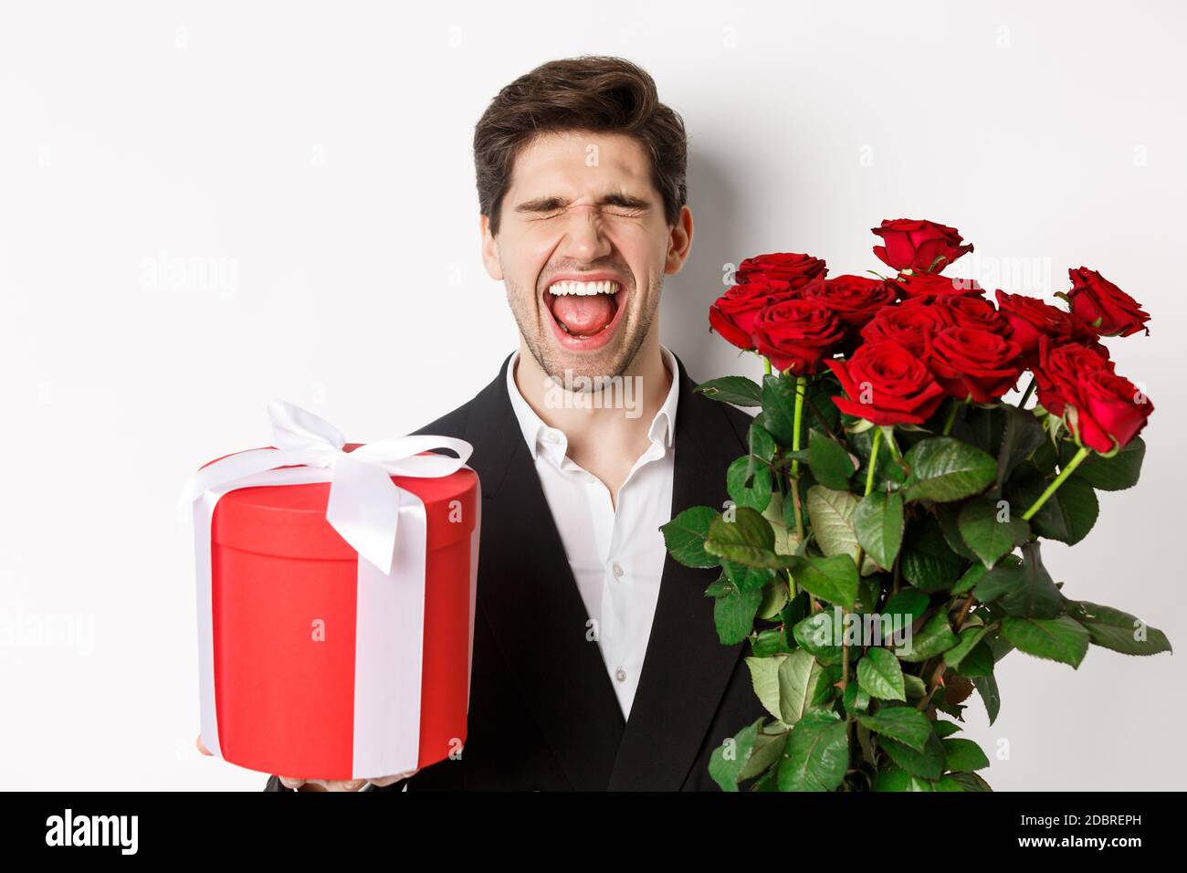 Image of sad guy in suit, got rejected and crying, holding bouquet of ...