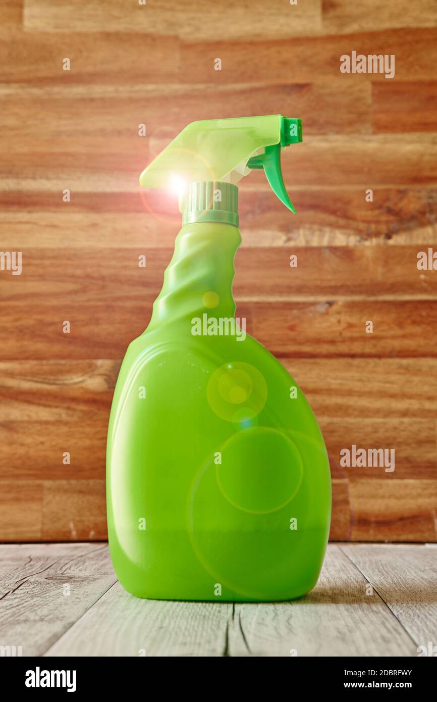 A studio photo of a green spray bottle Stock Photo - Alamy