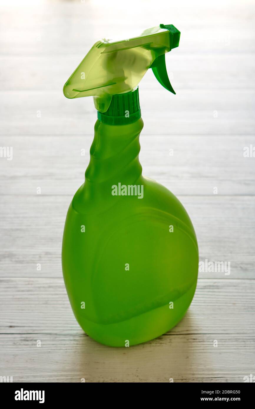 A studio photo of a green spray bottle Stock Photo - Alamy