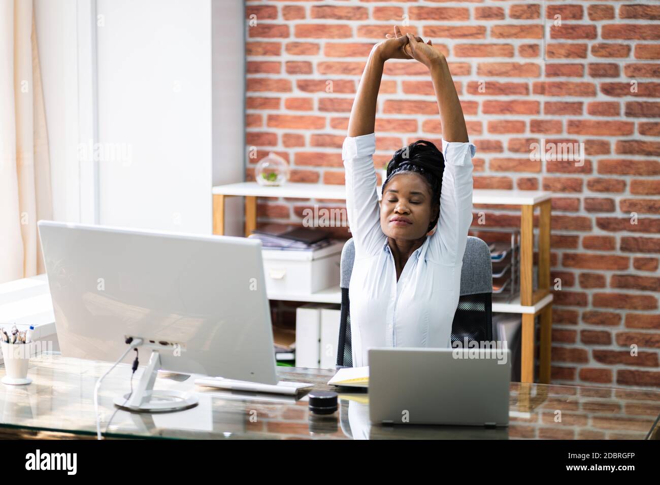 Smart Speaker Voice Assistant And Music Listening Stock Photo - Alamy