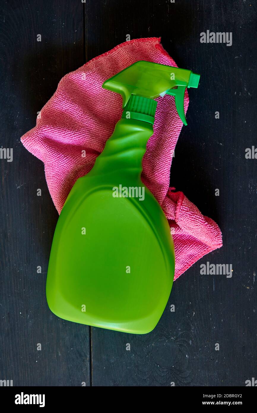 A studio photo of a green spray bottle Stock Photo - Alamy