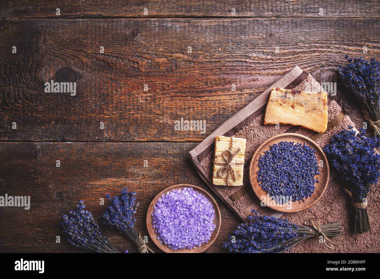 Flat lay composition with hand made soap bars, lavender salt and ...