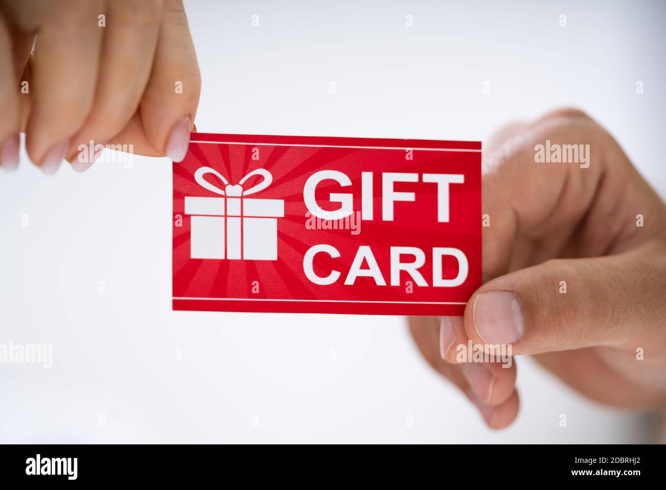 Close-up Of Person Hand Giving Gift Card To Another Person Stock Photo ...