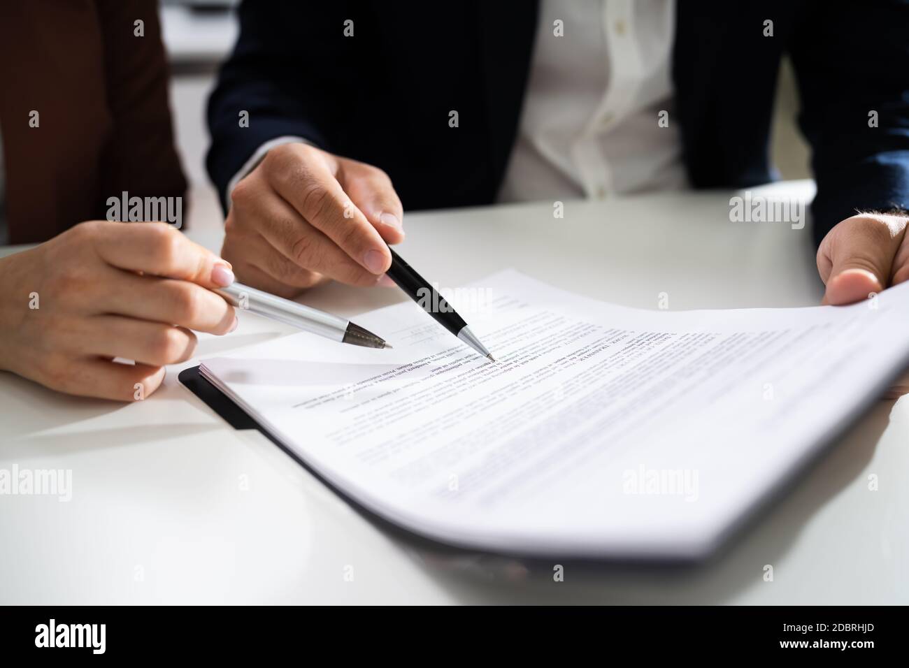 Lawyer People Review Document Before Signing In Office Stock Photo - Alamy