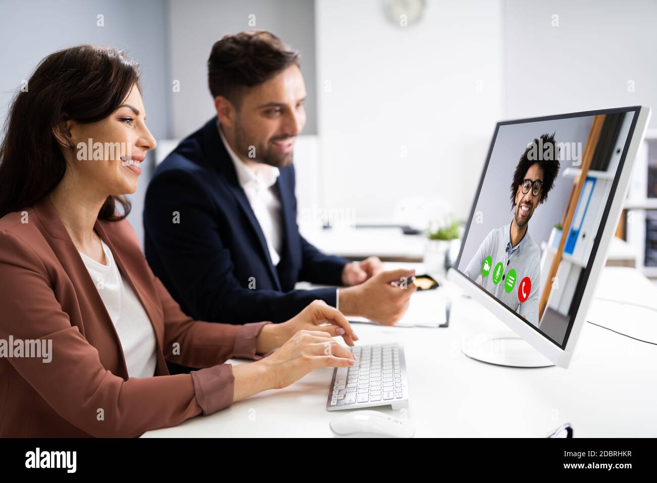 Online Video Conference Meeting On Computer In Office Stock Photo - Alamy