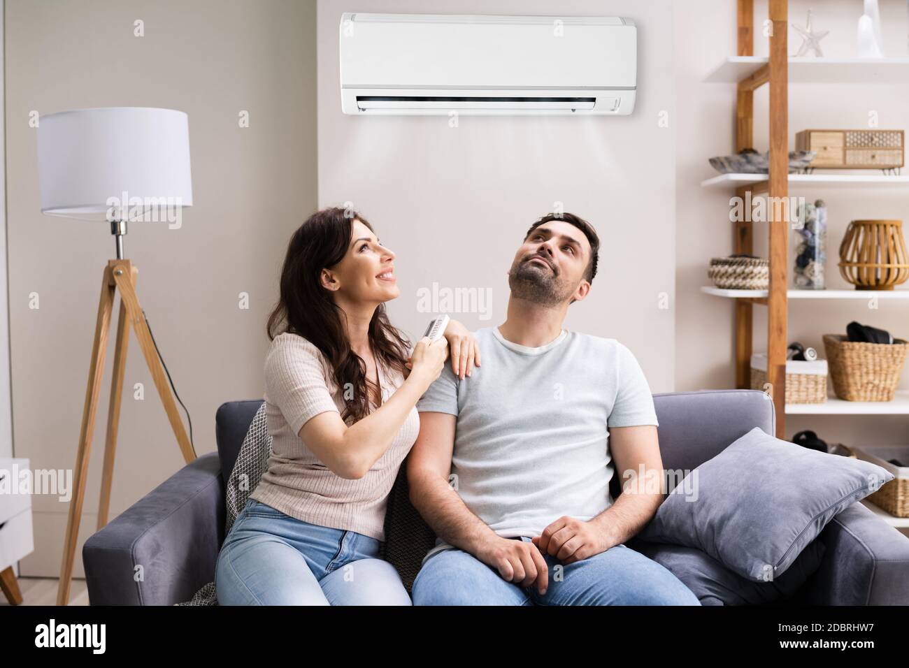 Family using air conditioning hi-res stock photography and images - Alamy