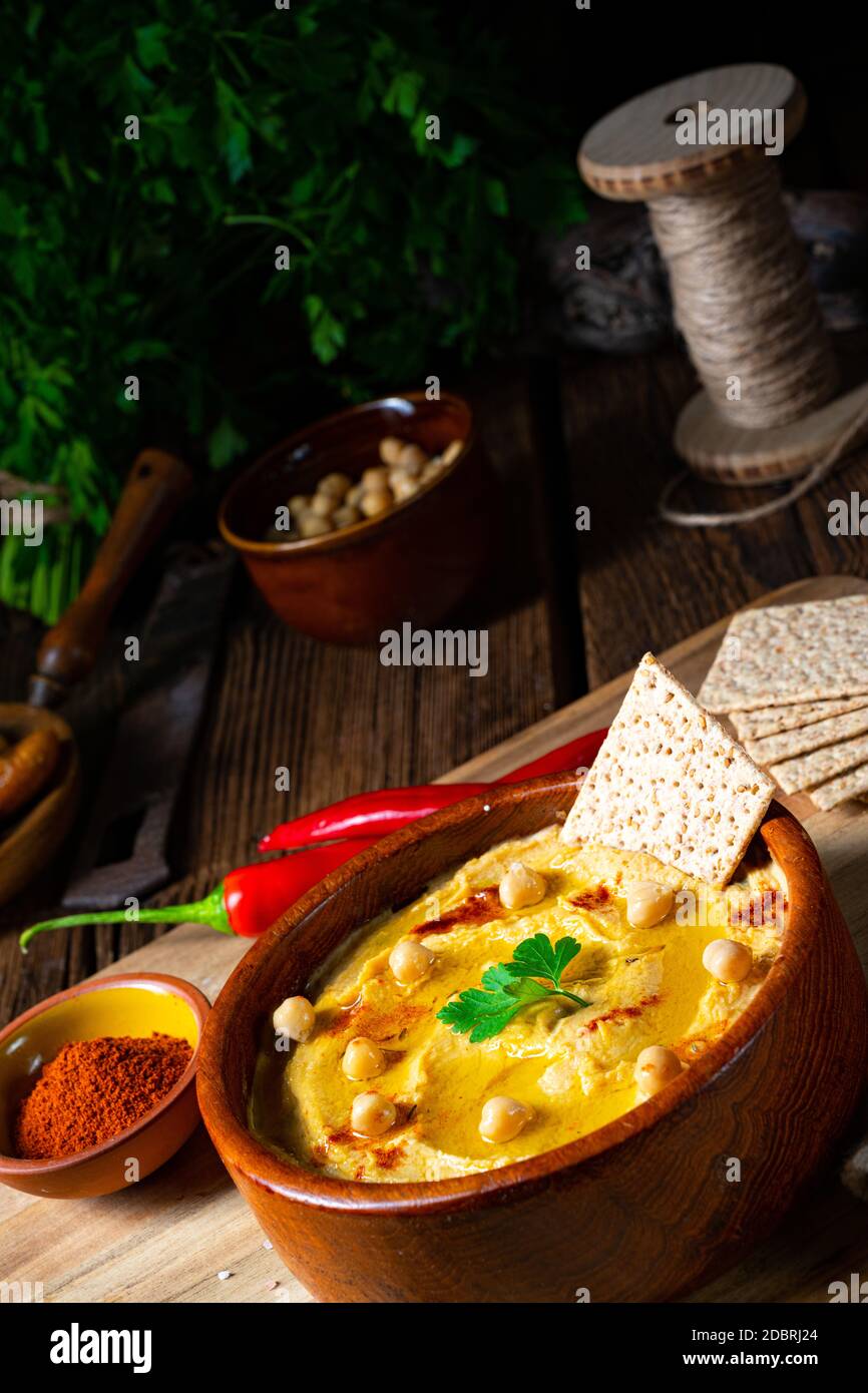 Delicious hummus paste with lemon and chilli Stock Photo - Alamy