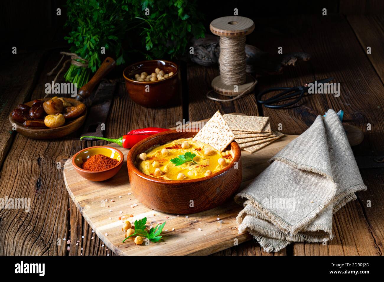 Delicious hummus paste with lemon and chilli Stock Photo - Alamy