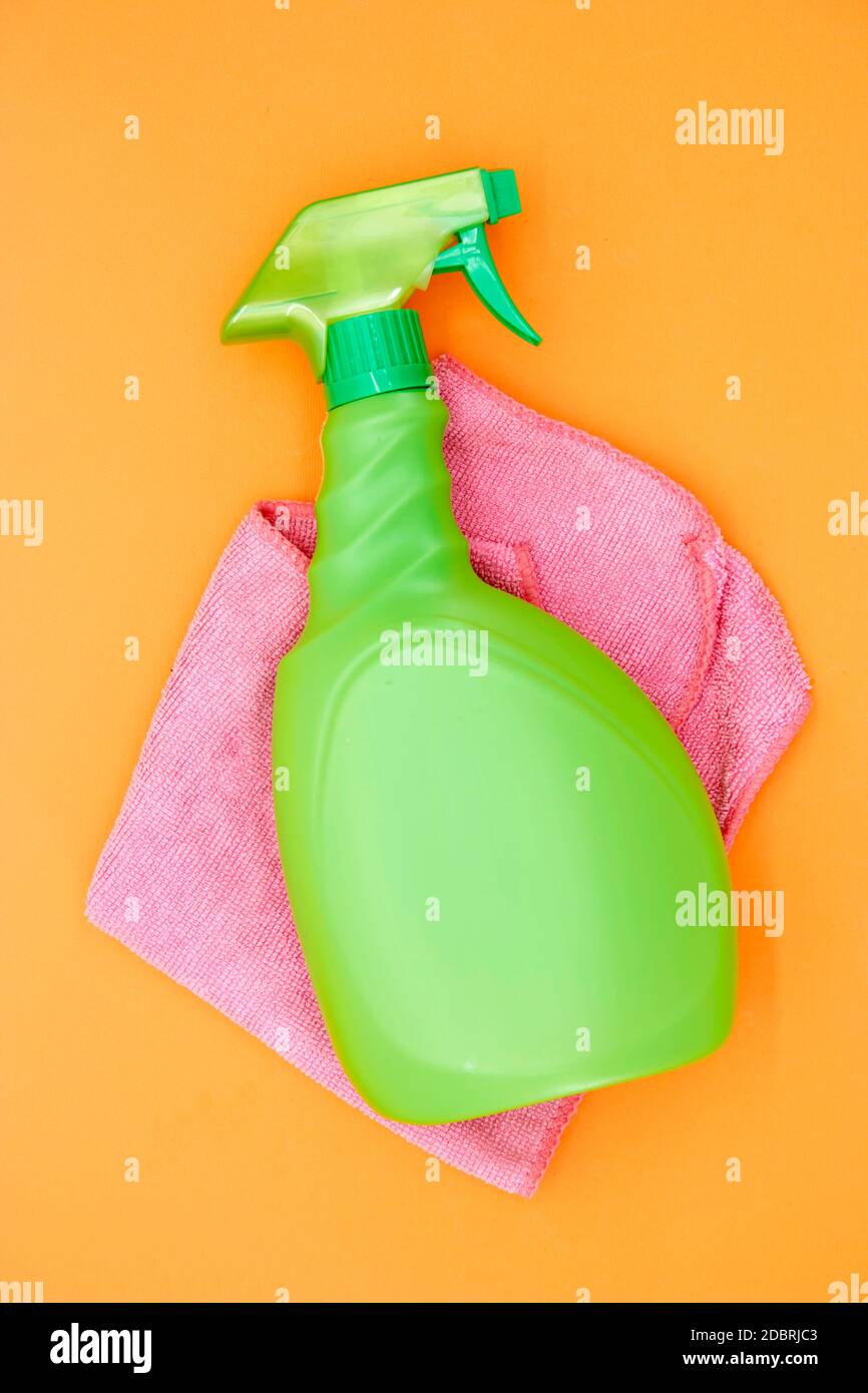 A studio photo of a green spray bottle Stock Photo - Alamy
