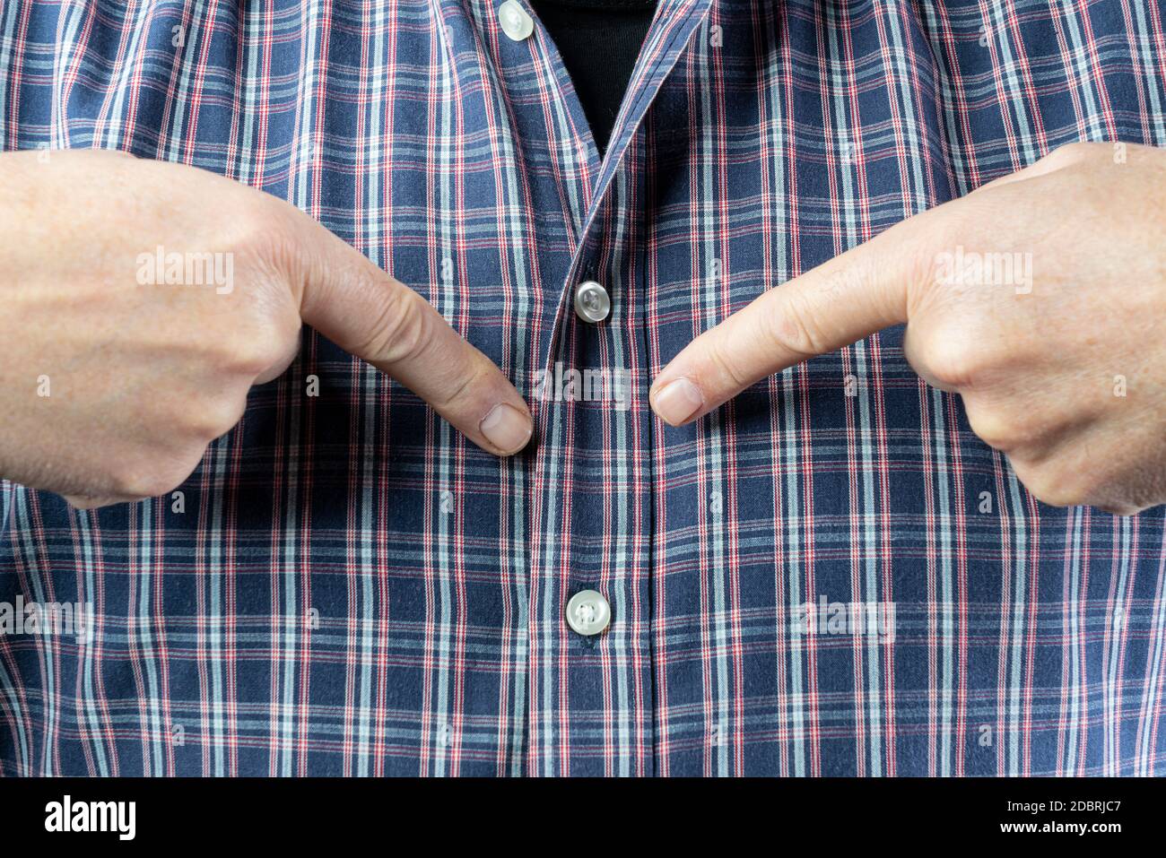 a man pointing at himself with his fingers Stock Photo - Alamy