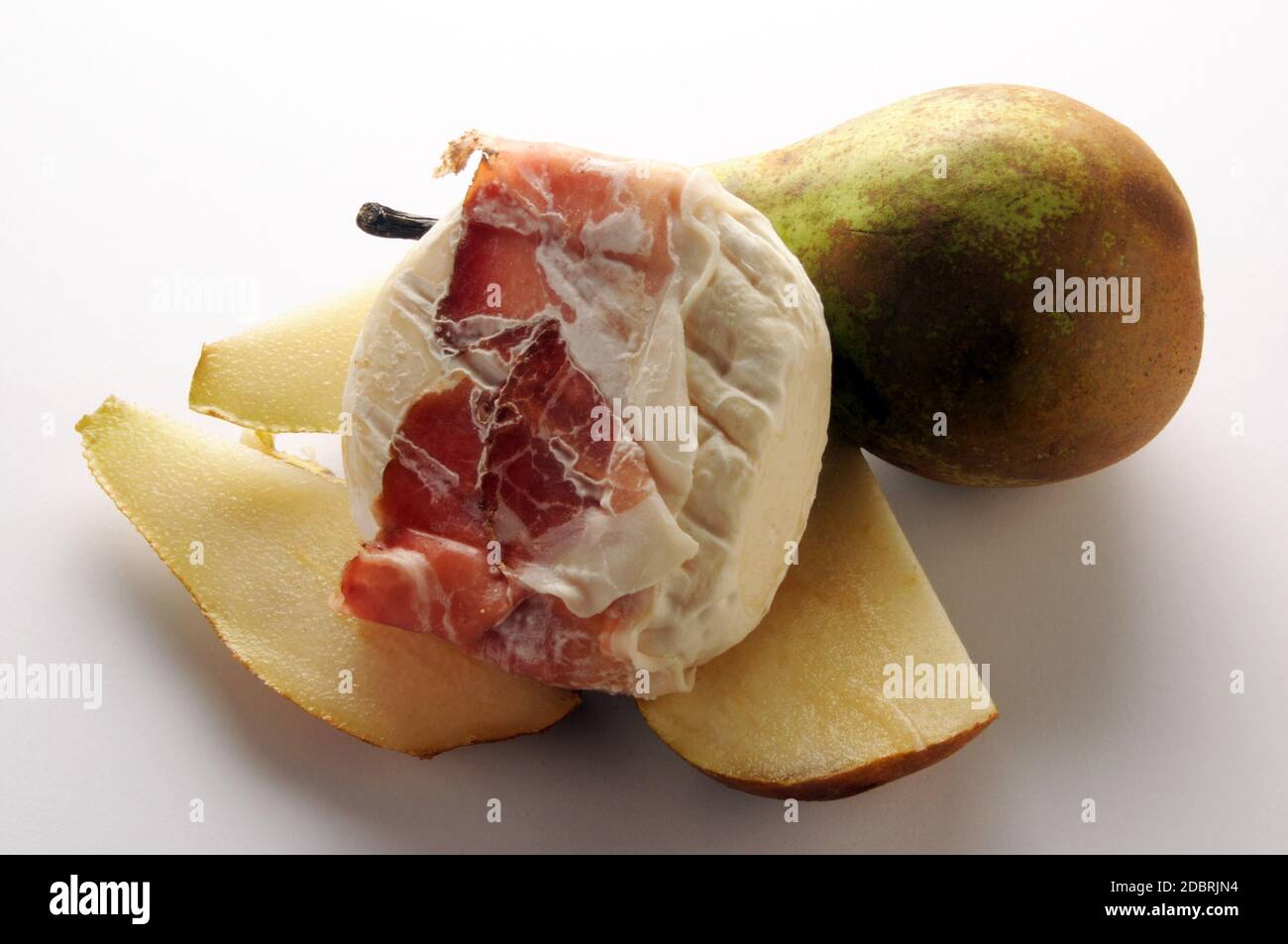 Traditional italian cheese tomino with bacon Stock Photo - Alamy