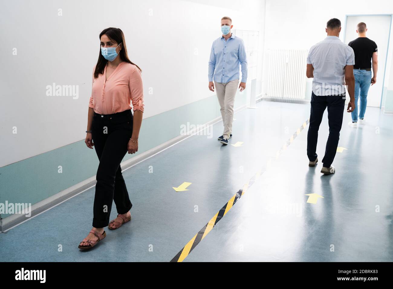 People In Office Following Social Distancing Protocols Wearing Face ...