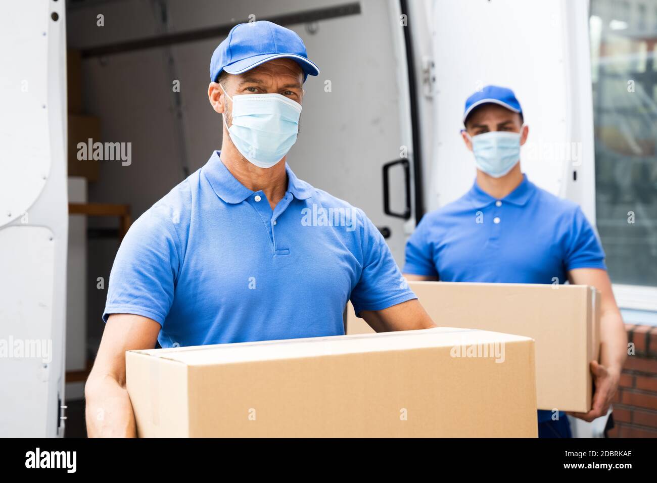 Delivery men hi-res stock photography and images - Alamy
