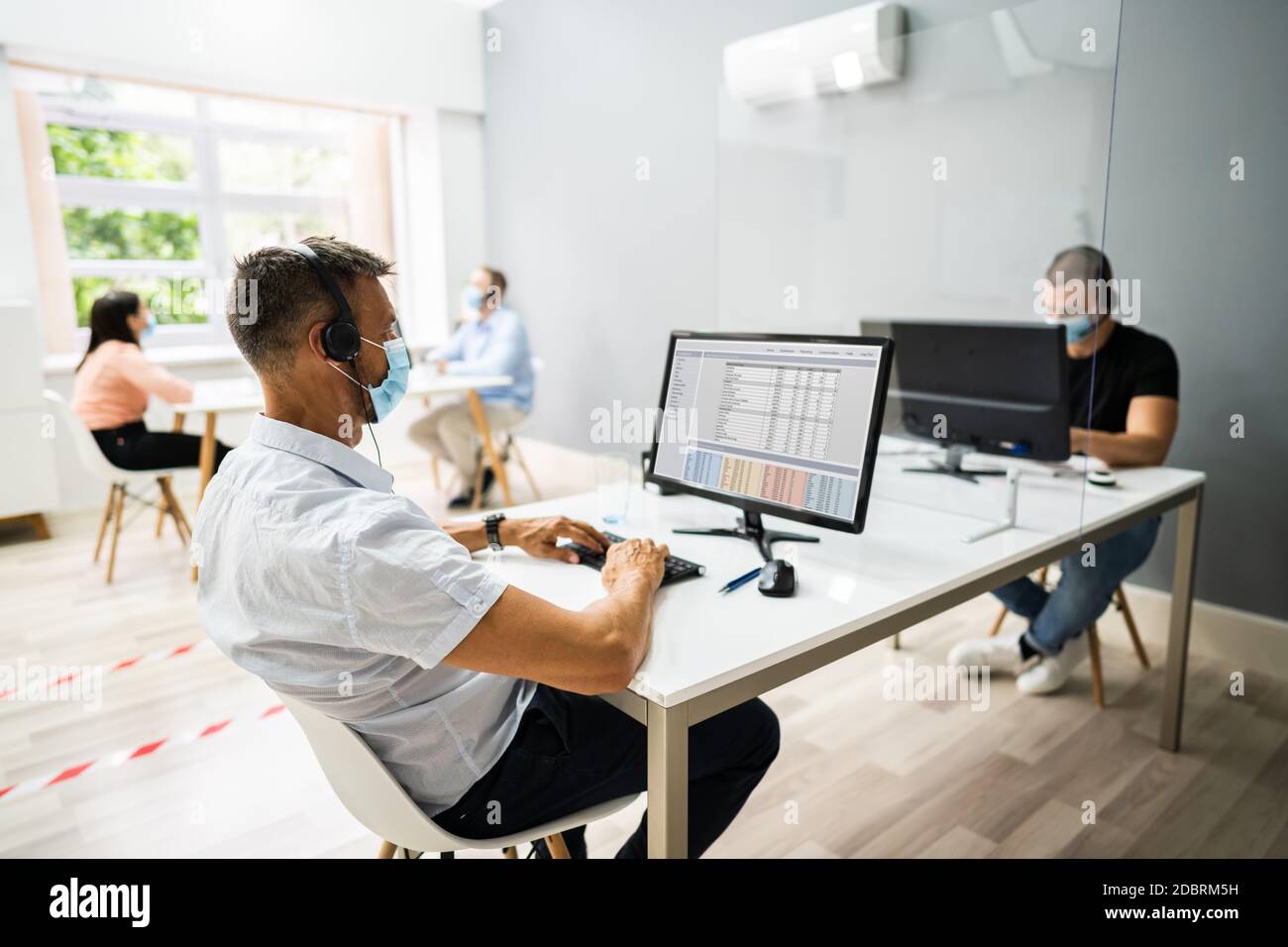Call Center Customer Service Agents Wearing Face Masks Stock Photo - Alamy