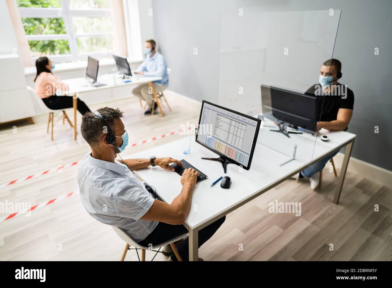 Call Center Customer Service Agents Wearing Face Masks Stock Photo - Alamy