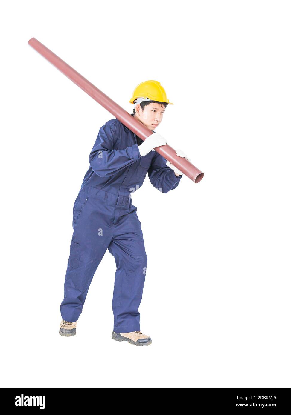 Young plumber in uniform holding pvc pipe isolated on white background ...