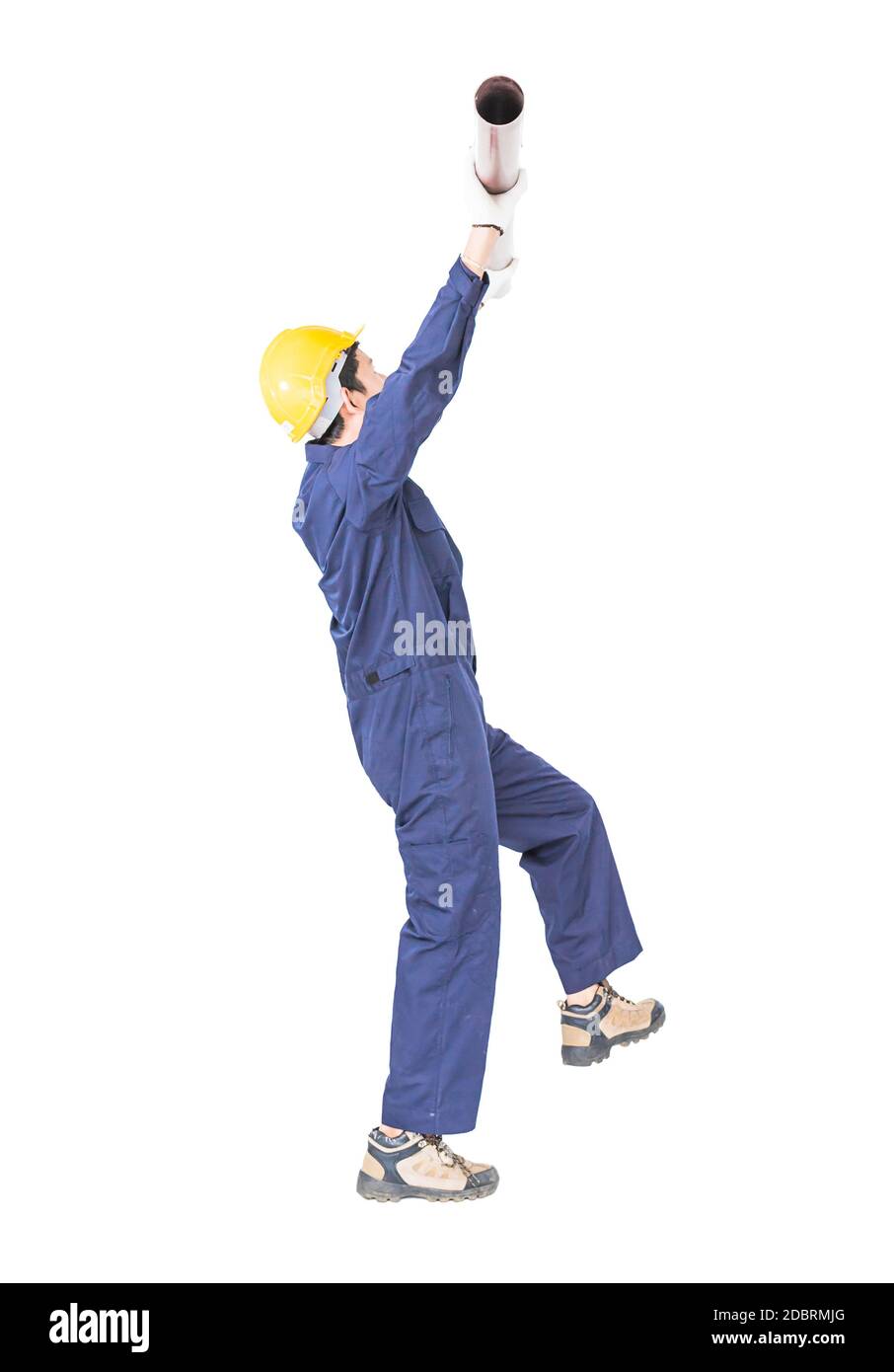 Young plumber in uniform holding pvc pipe isolated on white background ...