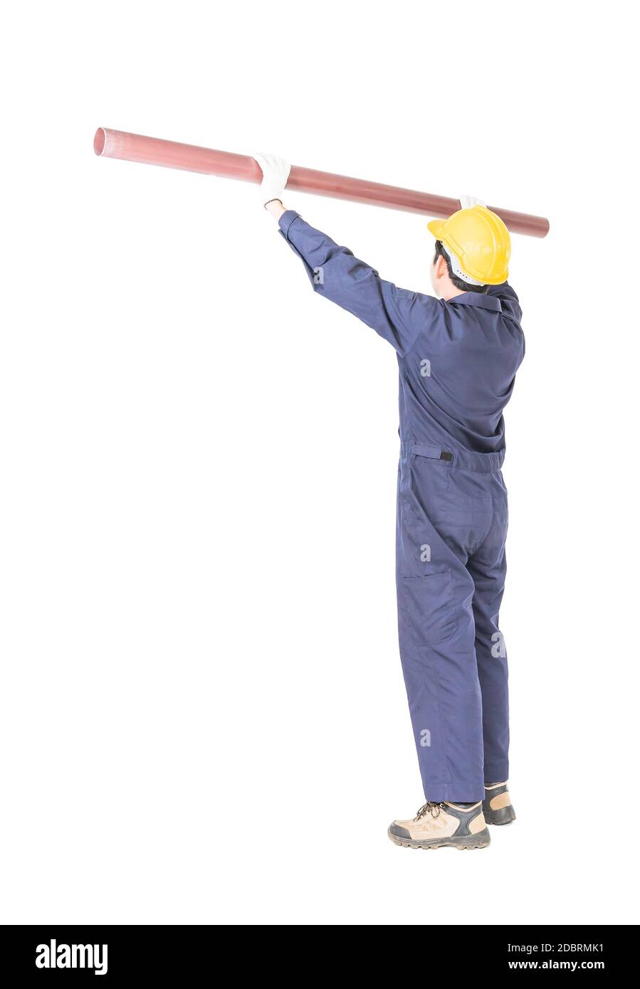 Young plumber in uniform holding pvc pipe isolated on white background ...