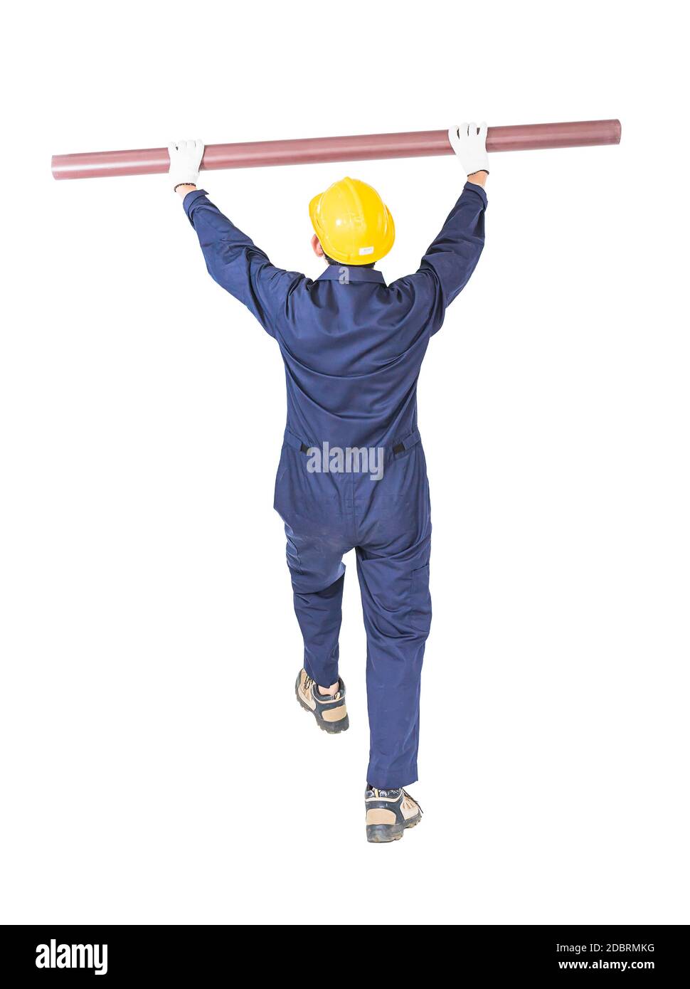 Young plumber in uniform holding pvc pipe isolated on white background ...