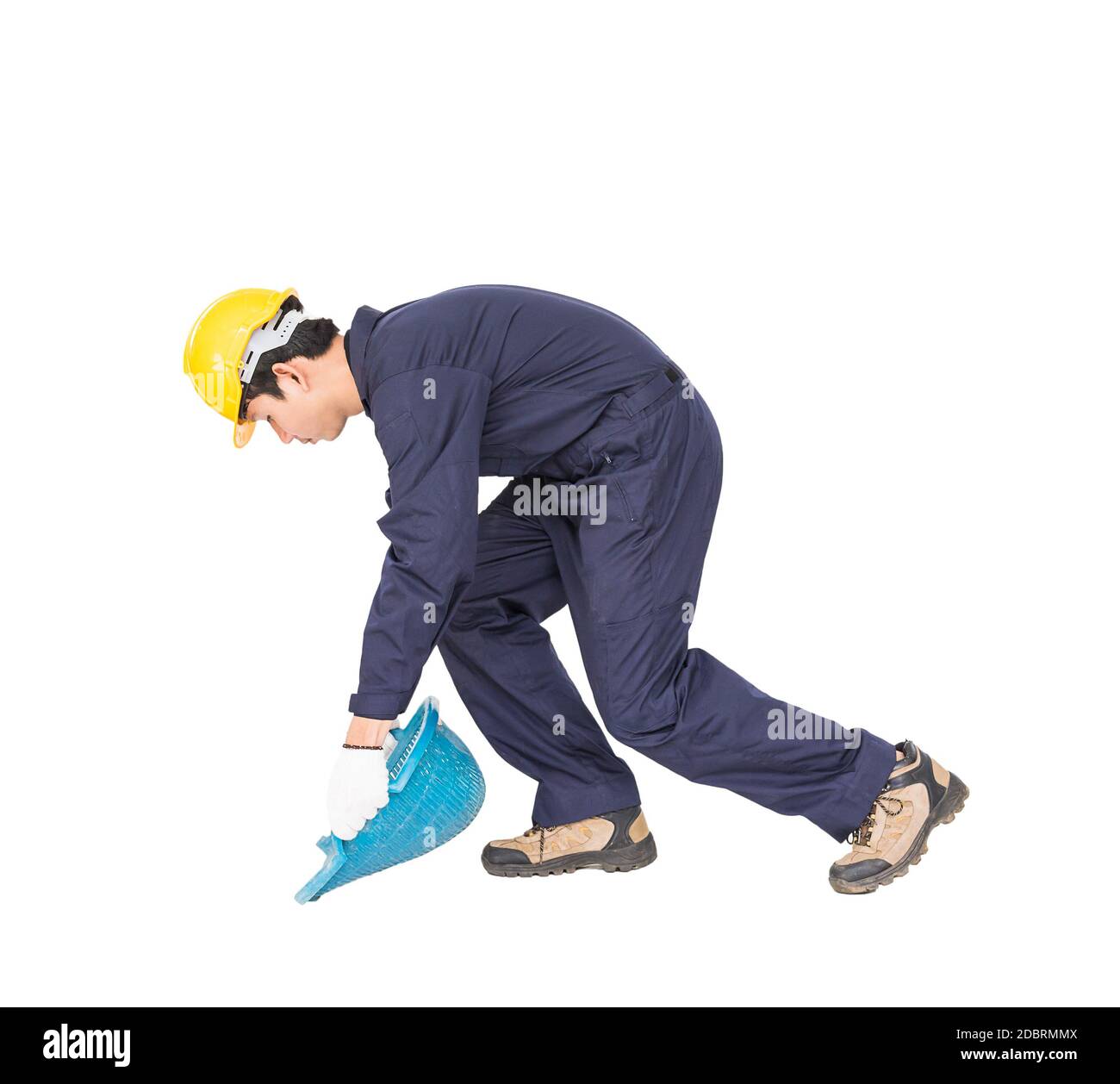 Young worker in uniform hold Hod or clam-shell shaped basket is a ...