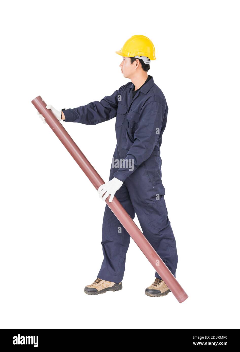 Young plumber in unifrom holding pvc pipe isolated on white background ...