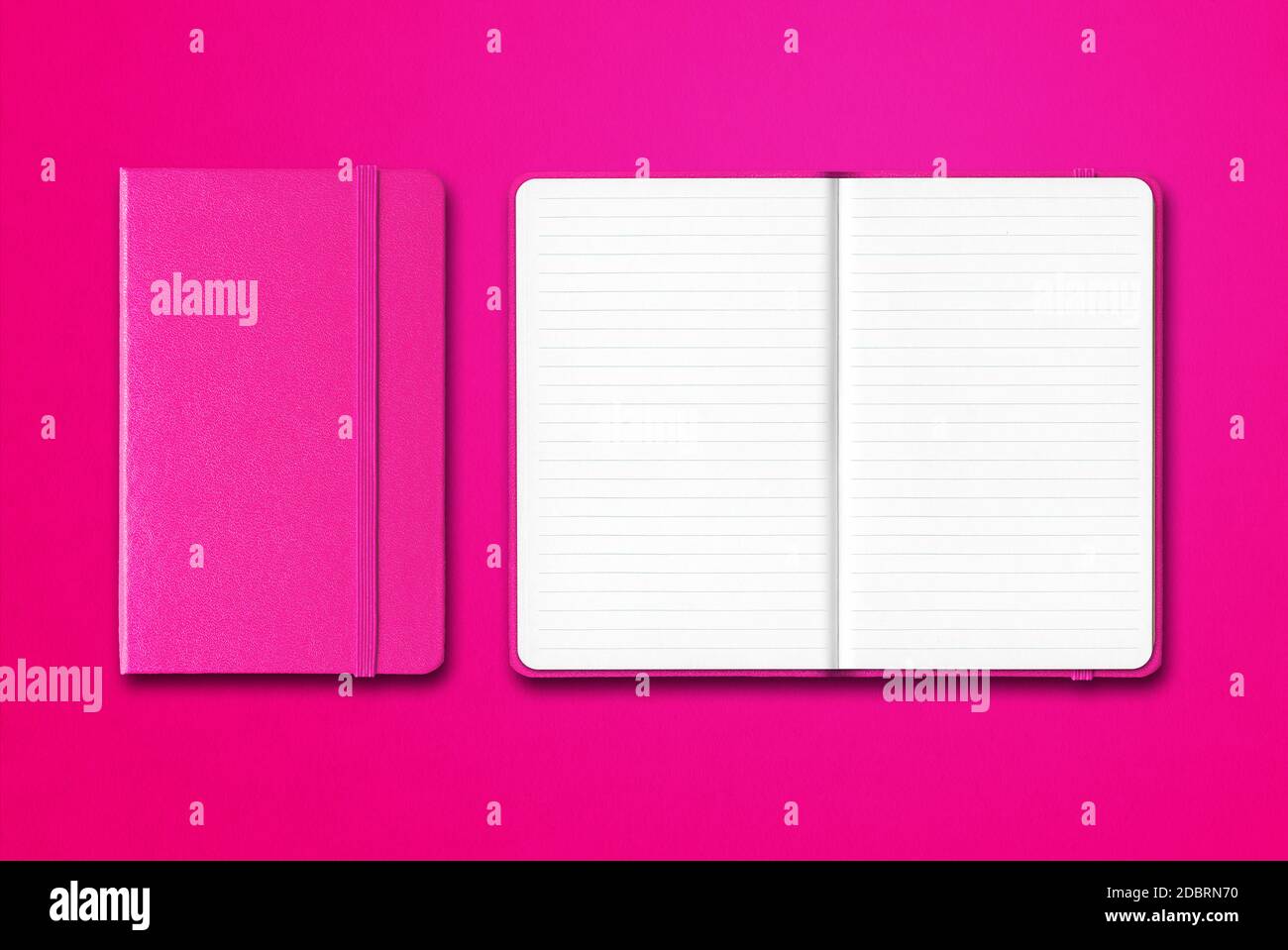 Pink closed and open lined notebooks mockup isolated on colorful ...