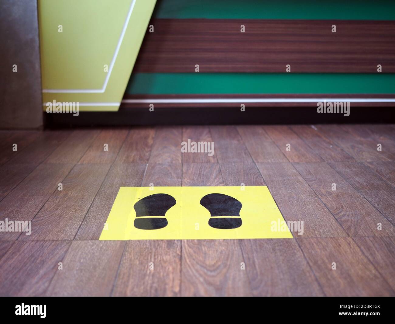 Image of markings for stand waiting area in a coffee shop to prevent ...