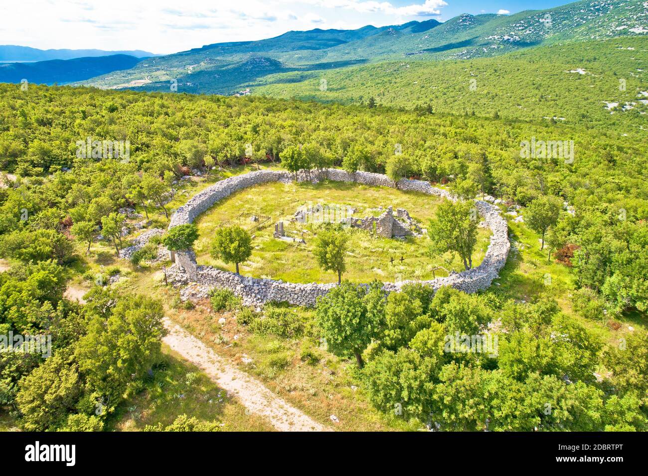 Circular cemetery historic landmark in Ledenice village aerial view ...
