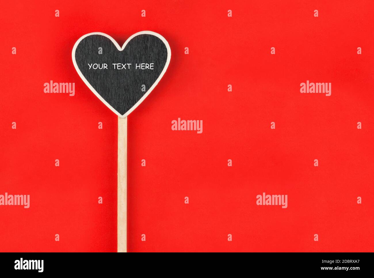 Pointer heart with space for your text, lies on red background Stock ...