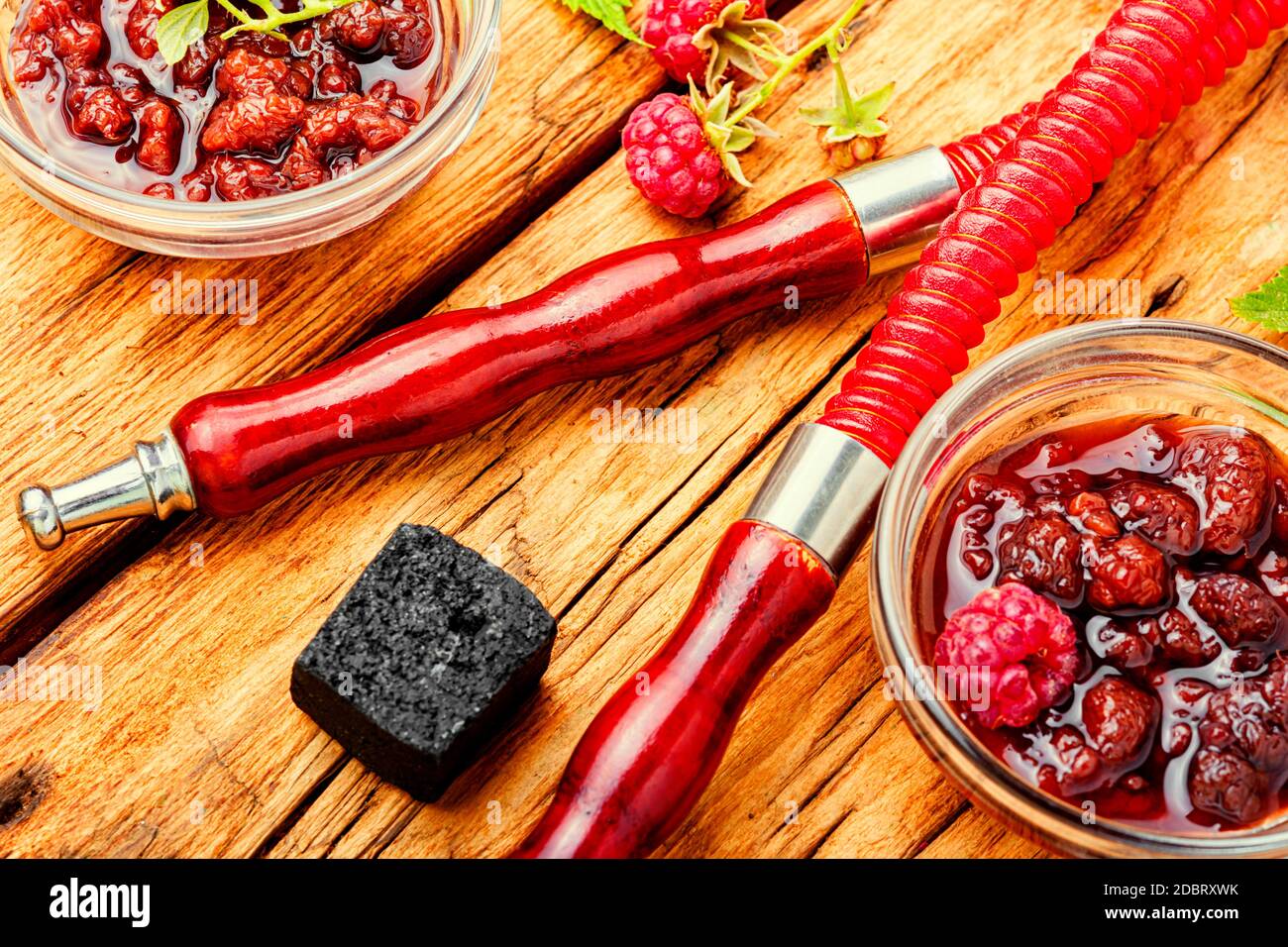 Oriental smoking hookah with tobacco with the aroma of raspberry jam ...