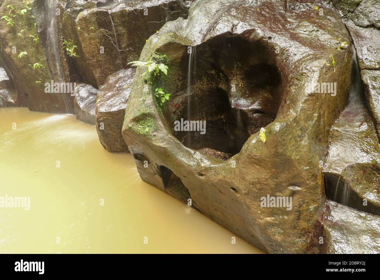 Erosion created hole in the shape of a heart in the rock. A heart ...