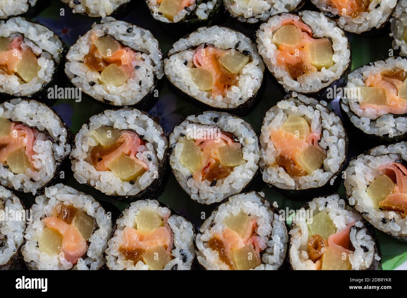 Top view of stack of Japanese sushi maki roll plate. Served in Japanese ...
