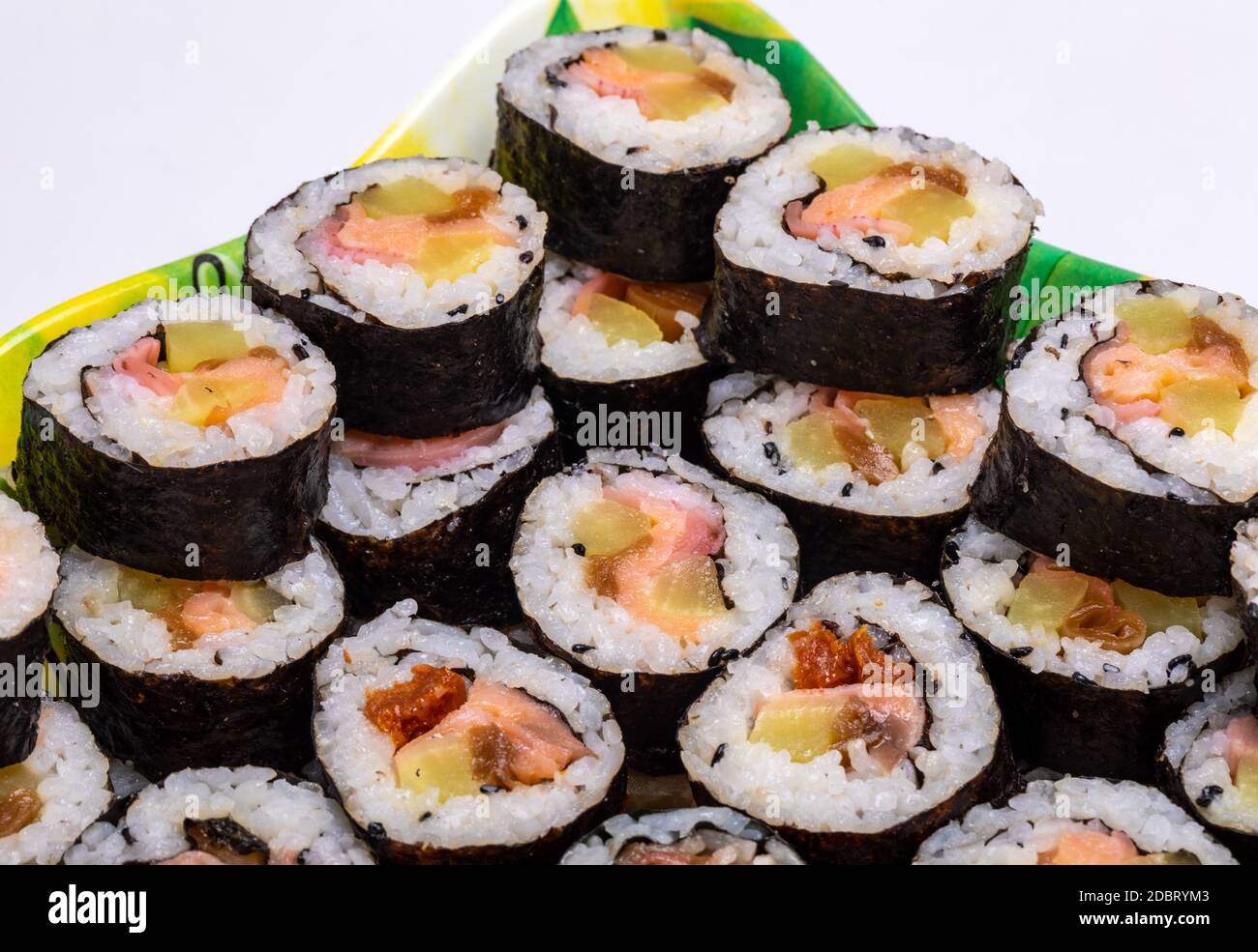 Top view of stack of Japanese sushi maki roll plate. Served in Japanese ...
