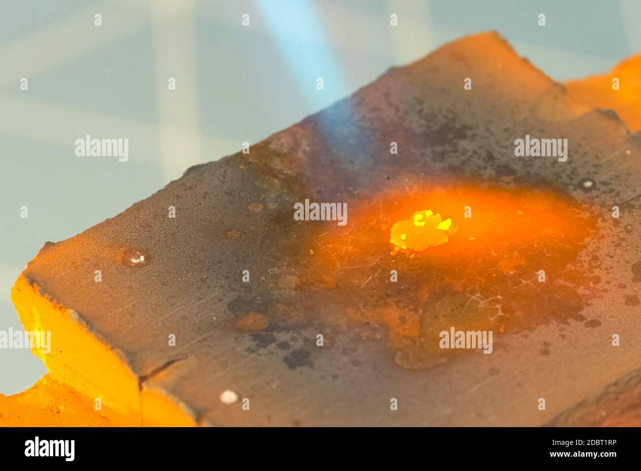 Gold smelting from slag using a gas burner Stock Photo - Alamy