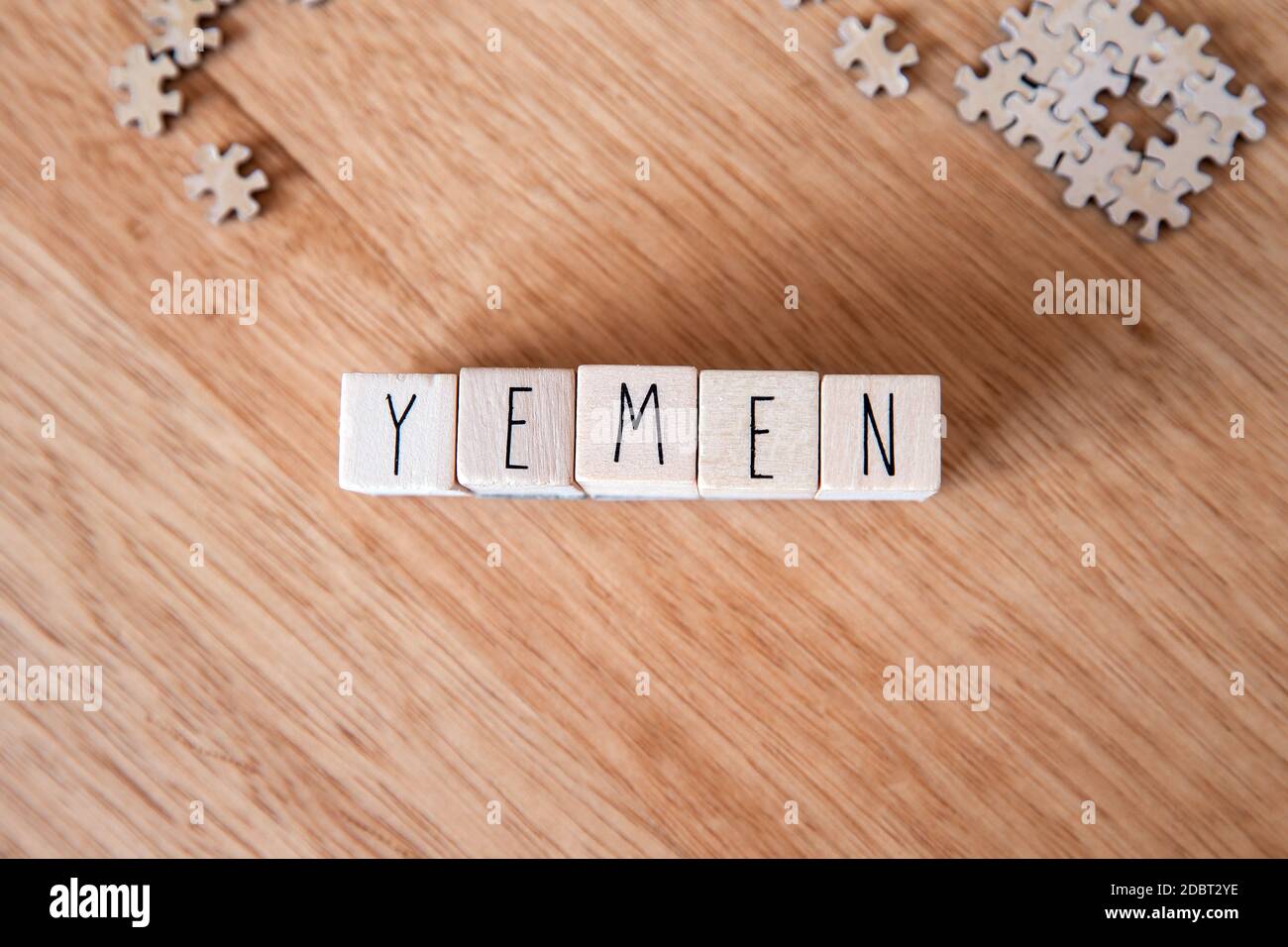 The Country Yemen written on wooden cubes on wooden background, Country ...