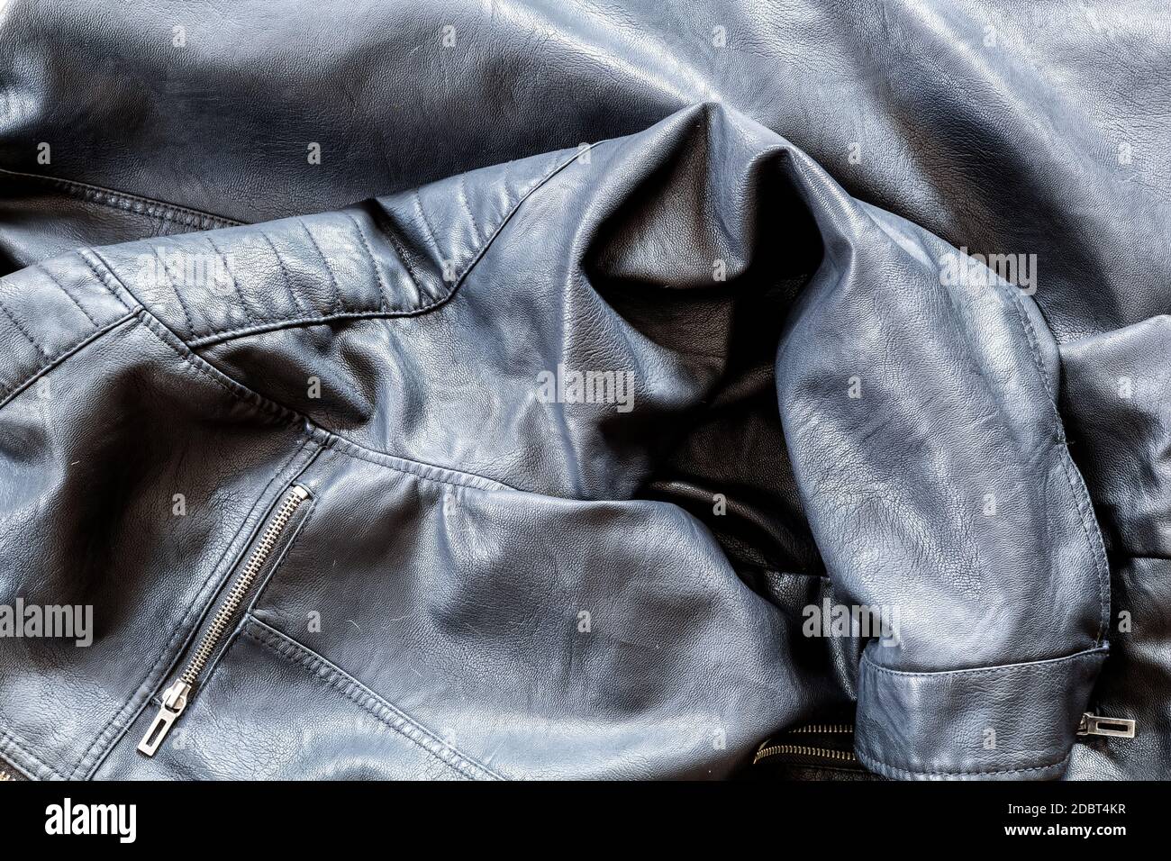 Stylish black leather jacket on the floor Stock Photo - Alamy