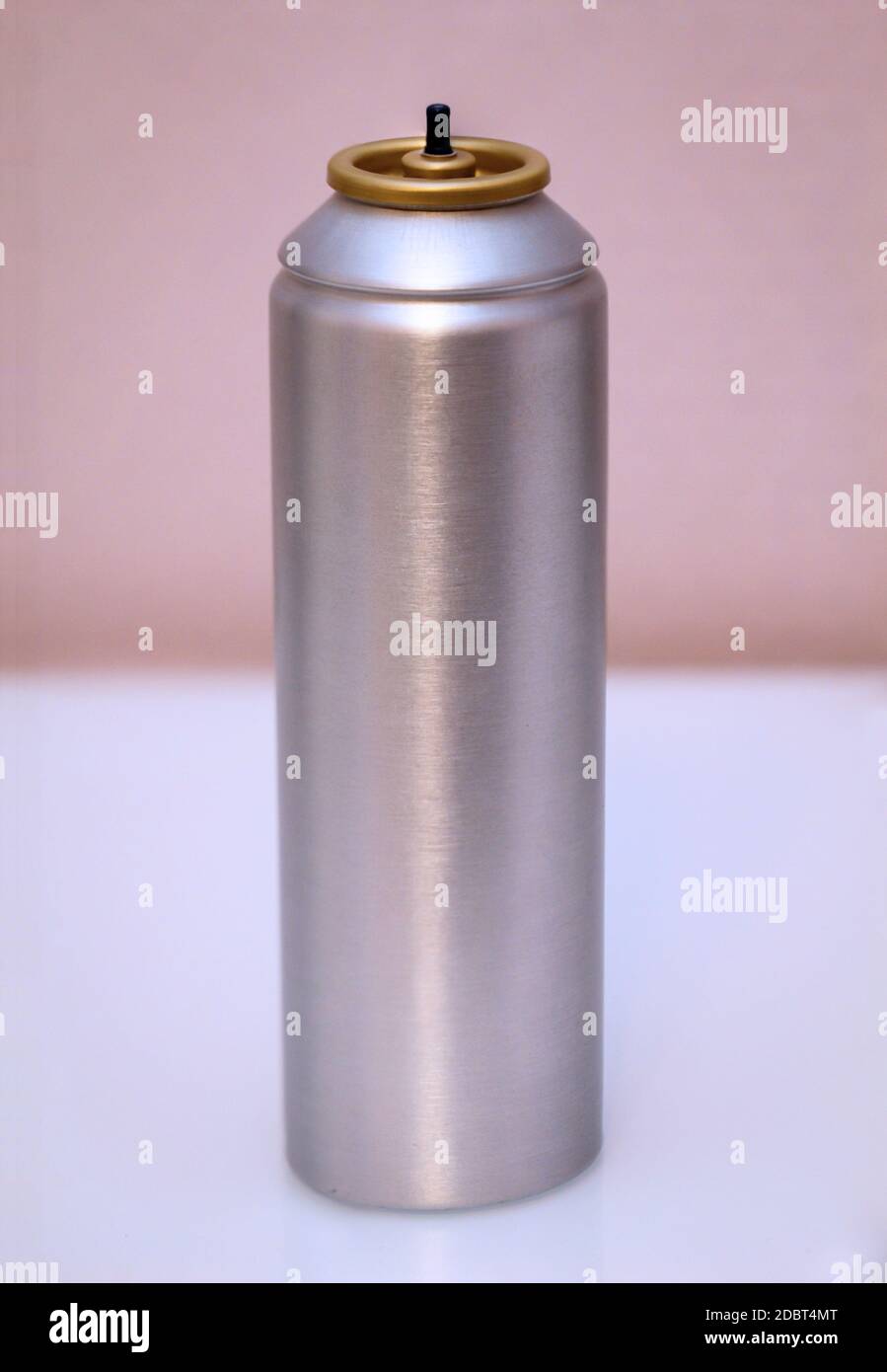 Inclusion of a metal spray can as used for hairspray Stock Photo - Alamy