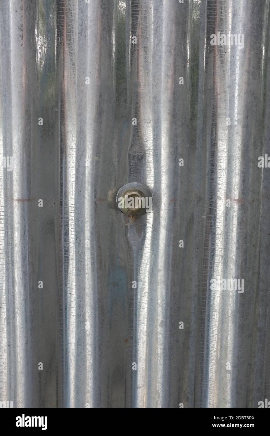 zinc industrial wall with nut texture background Stock Photo - Alamy