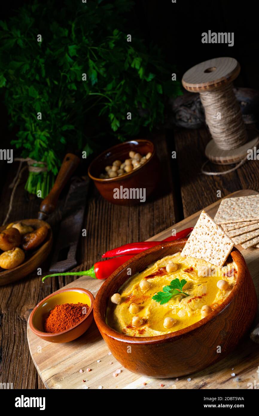 Delicious hummus paste with lemon and chilli Stock Photo - Alamy