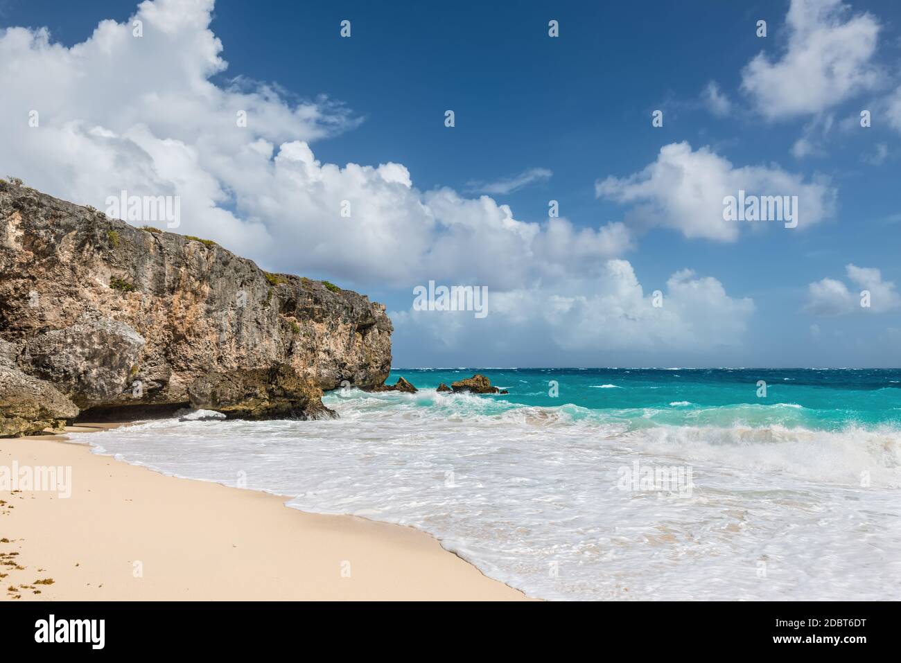 Rugged cliffs at Bottom Bay on the Atlantic south east coast of the ...